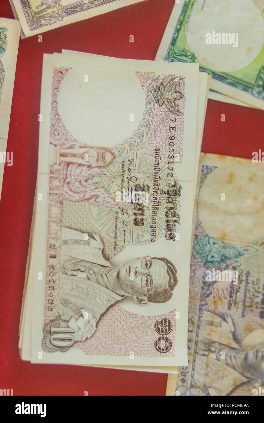 Vintage Thai King Bhumibol Adulyadej on banknotes. Old Thai baht ...