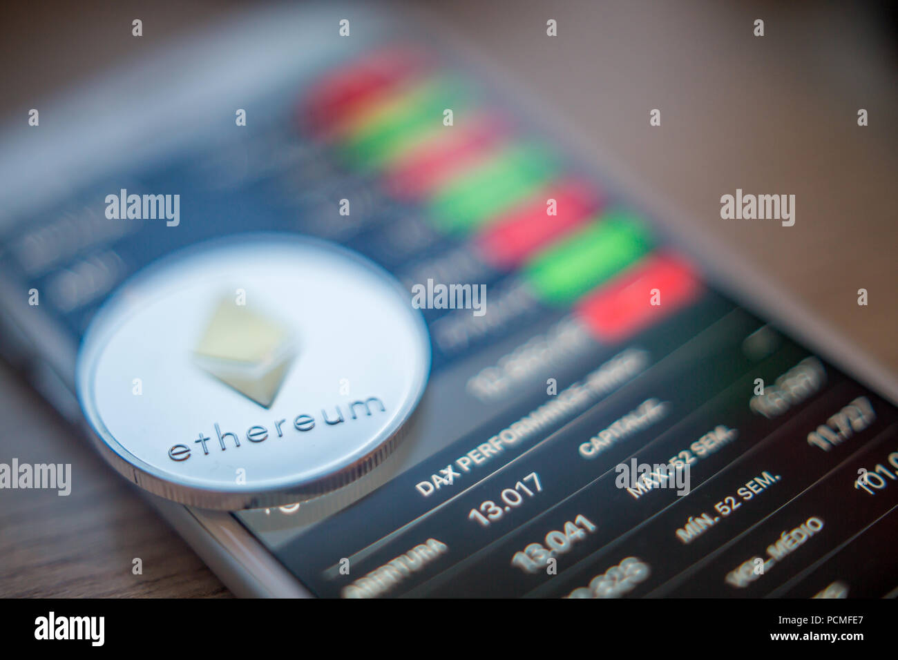 Metal Bitcoins and Ethereum coins. Bitcoin, Ethereum - modern virtual ...