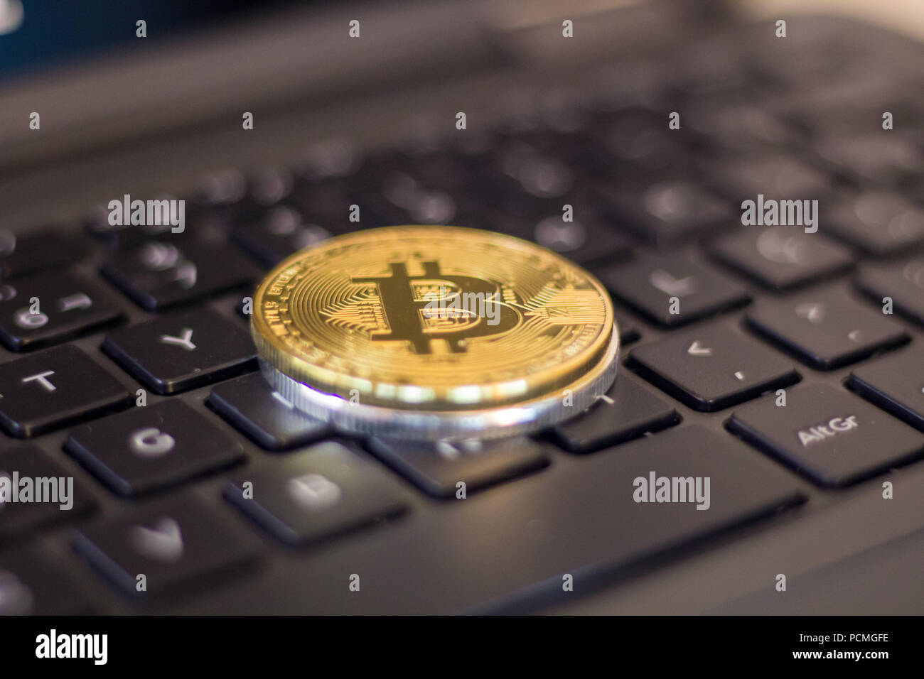 Metal Bitcoins and Ethereum coins. Bitcoin, Ethereum - modern virtual ...