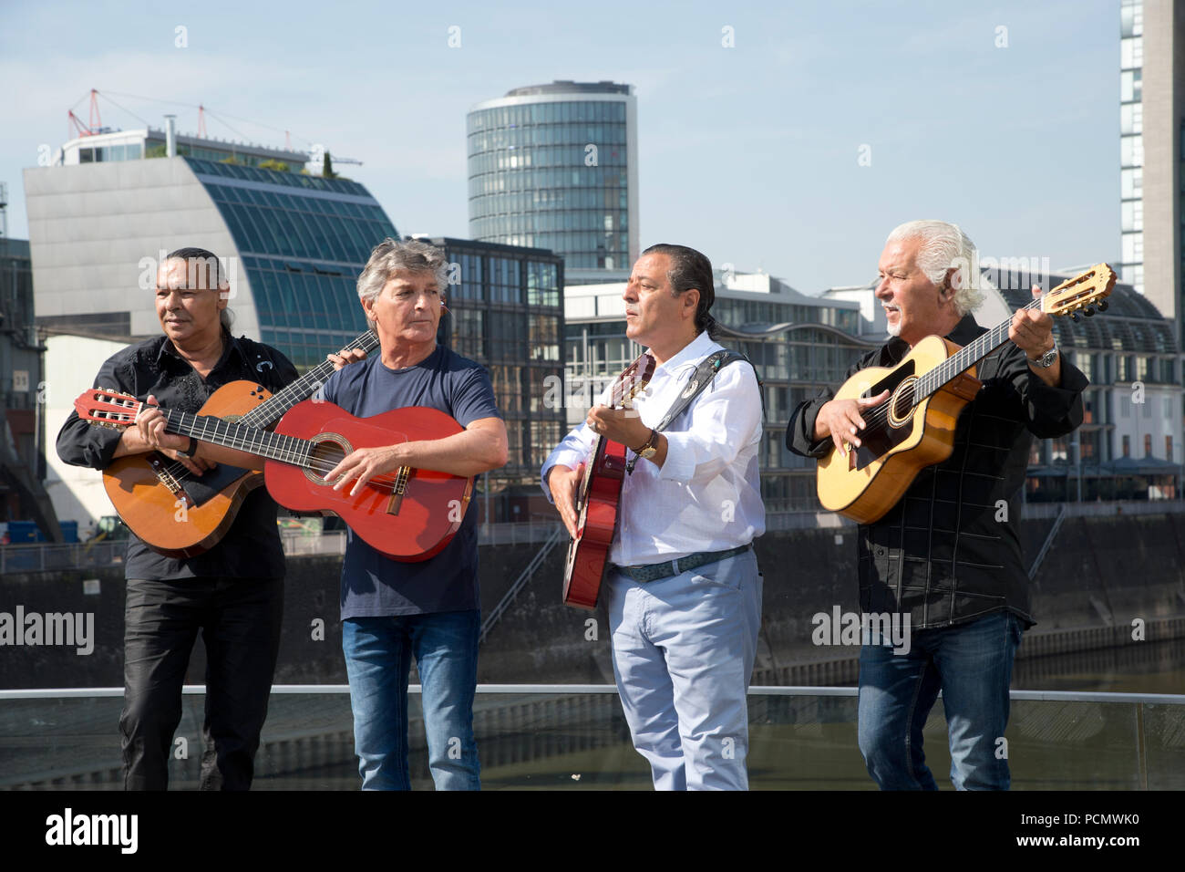 The GIPSY KINGS pose with their guitars for a photo shoot in the ...