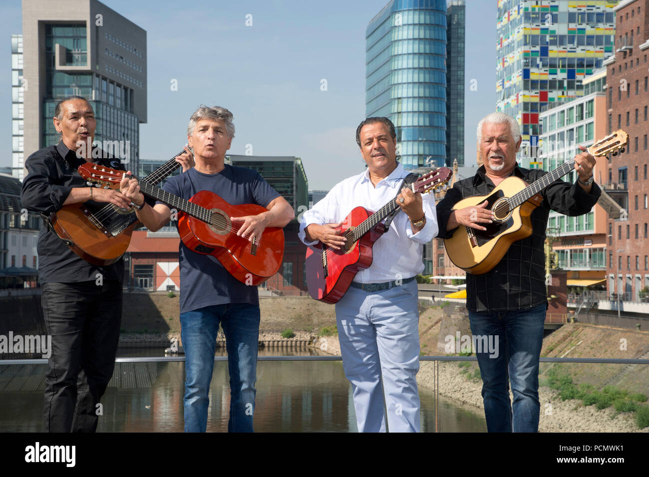 The GIPSY KINGS pose with their guitars for a photo shoot in the ...