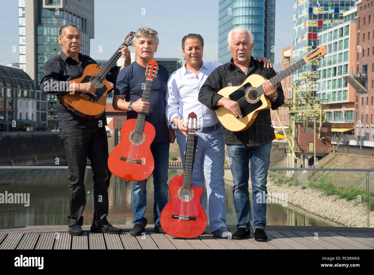 The GIPSY KINGS pose with their guitars for a photo shoot in the ...