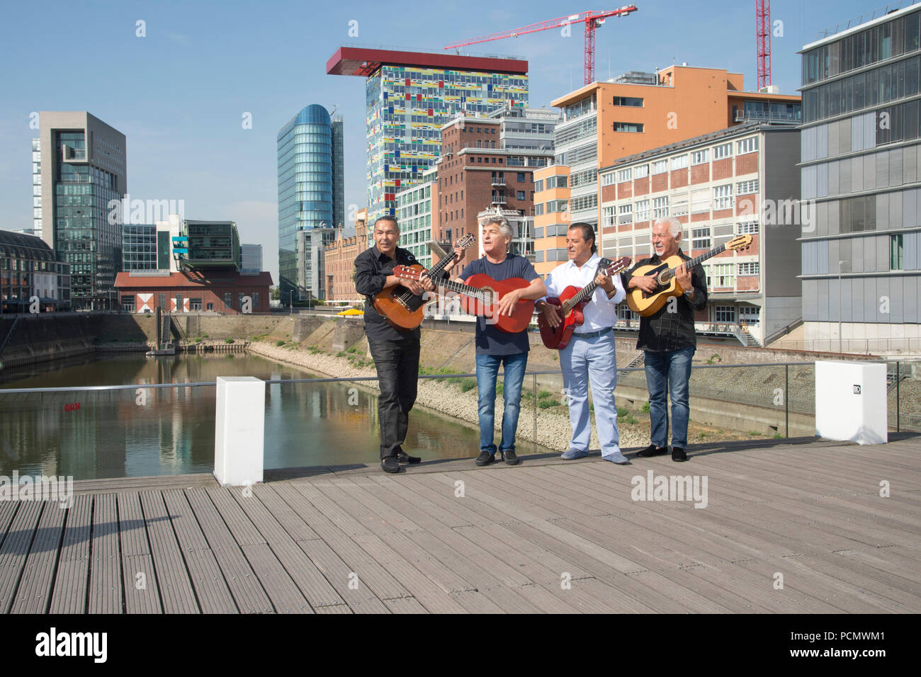 The GIPSY KINGS pose with their guitars for a photo shoot in the ...