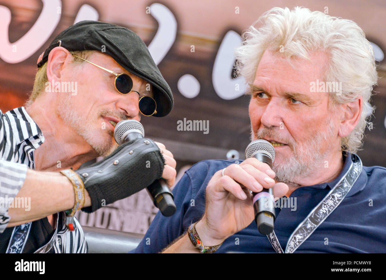 Wacken, Germany. 03rd Aug, 2018. Roetger Feldmann (L) alias "Broesel ...