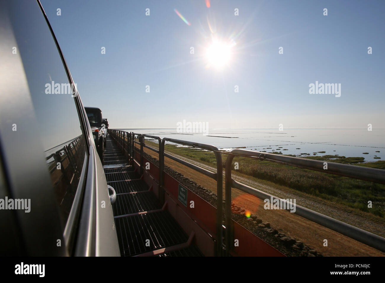 Sylt, Germany. 03rd Aug, 2018. The sun shines on the motorail train ...