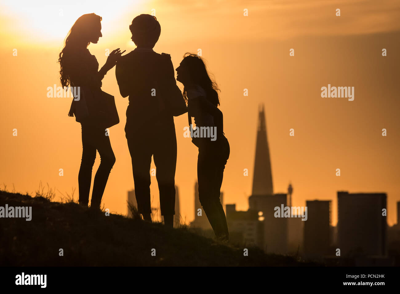 London, UK. 3rd August, 2018. UK Weather: Dramatic sunset seen from the ...