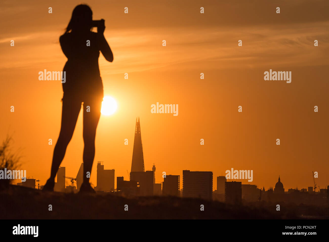 London, UK. 3rd August, 2018. UK Weather: Dramatic sunset seen from the ...