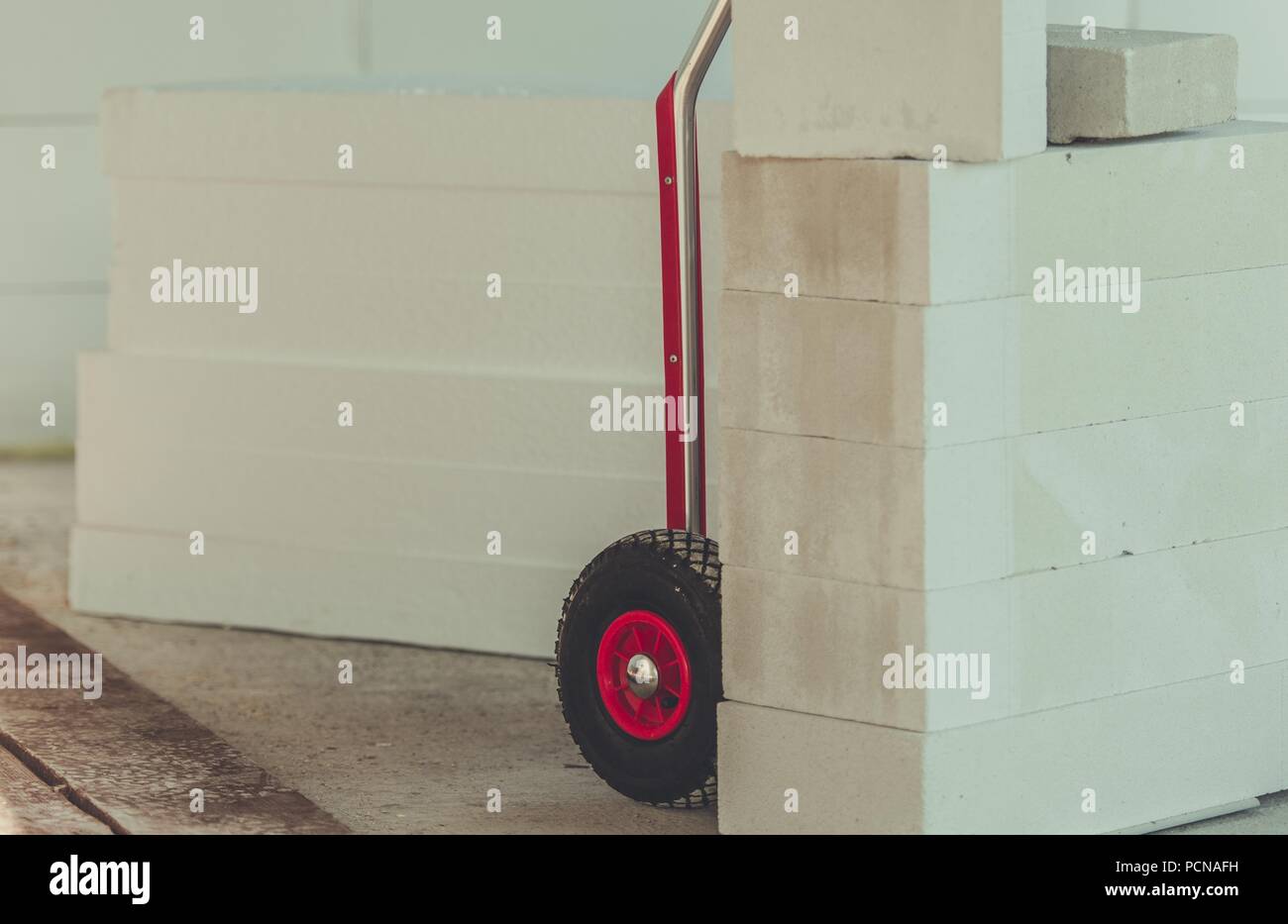 Concrete Blocks Moving on the Basic Moving Cart. Construction Industry ...