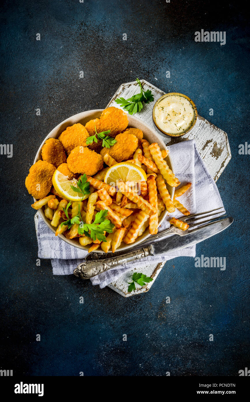 English traditional fast food, junk food, British dish Fish and chips ...