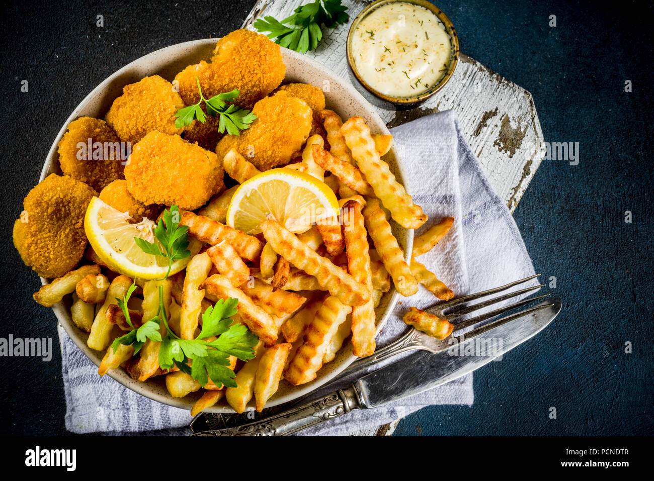 English traditional fast food, junk food, British dish Fish and chips ...