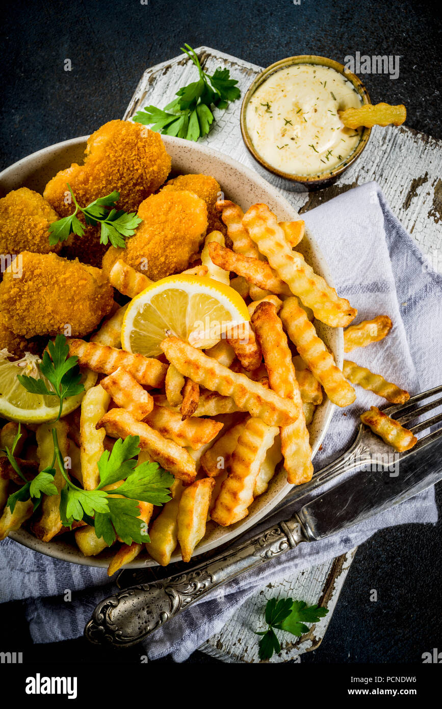 English traditional fast food, junk food, British dish Fish and chips ...