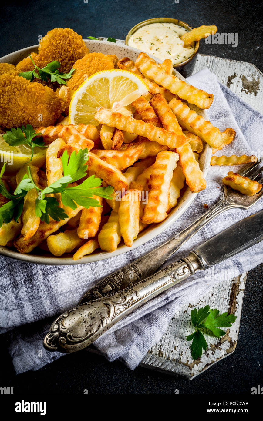 English traditional fast food, junk food, British dish Fish and chips ...