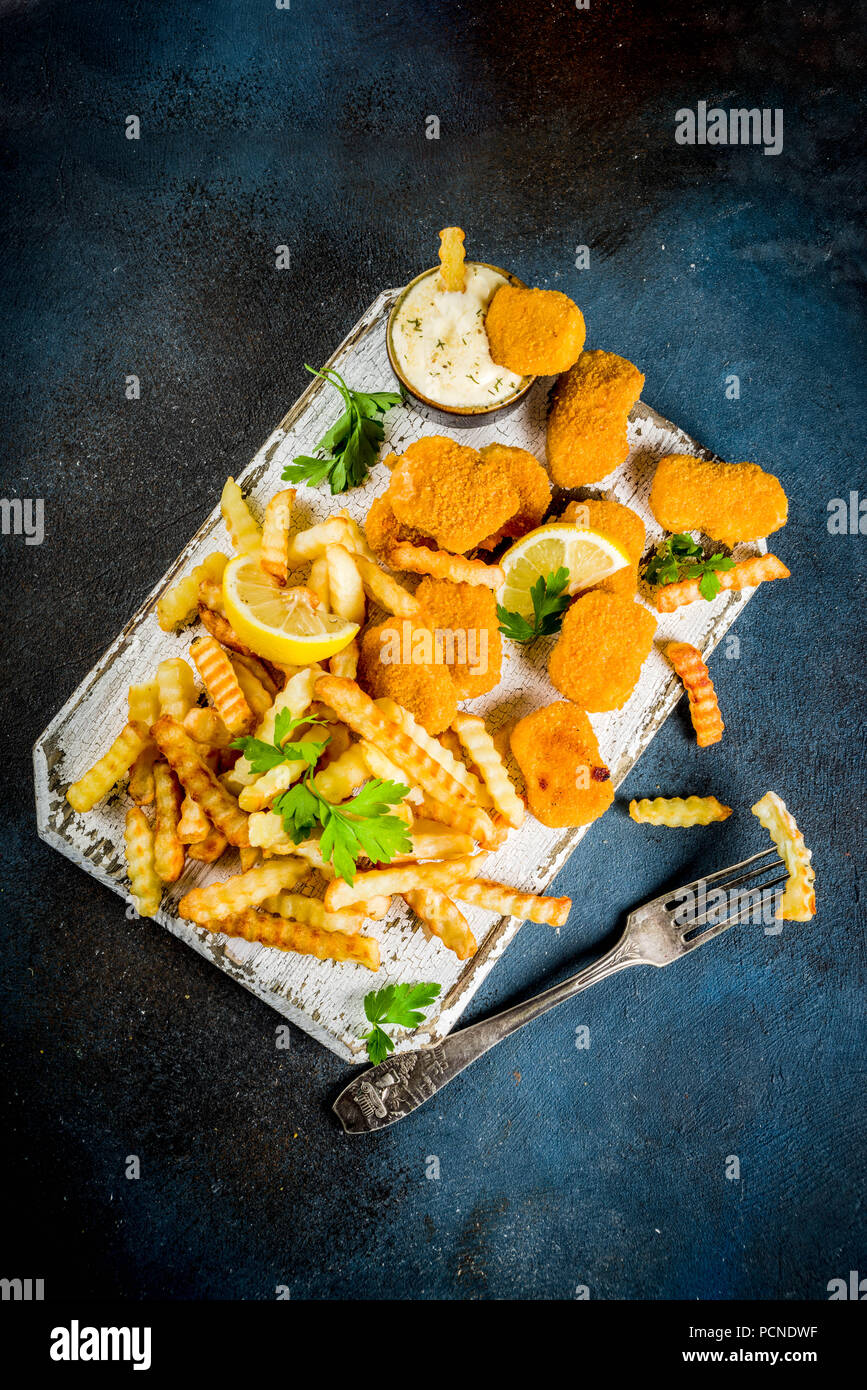 English traditional fast food, junk food, British dish Fish and chips ...
