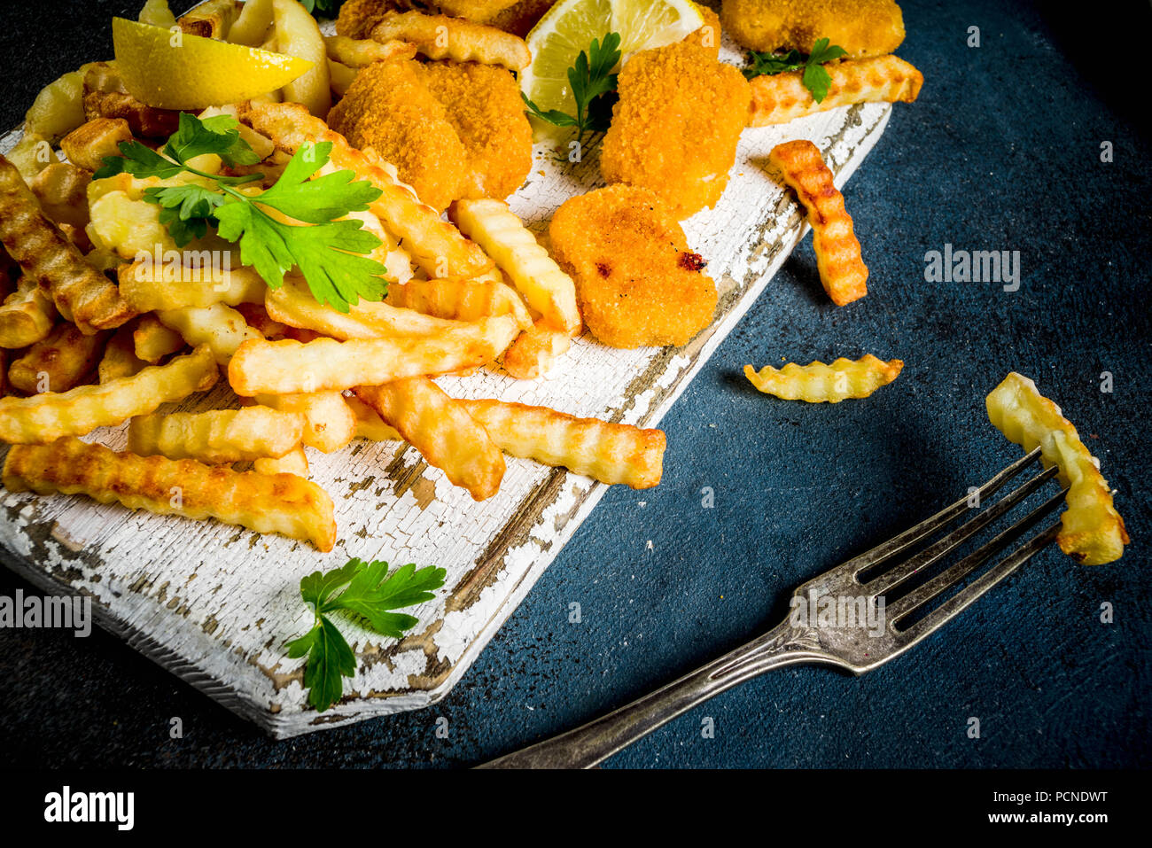 English traditional fast food, junk food, British dish Fish and chips ...