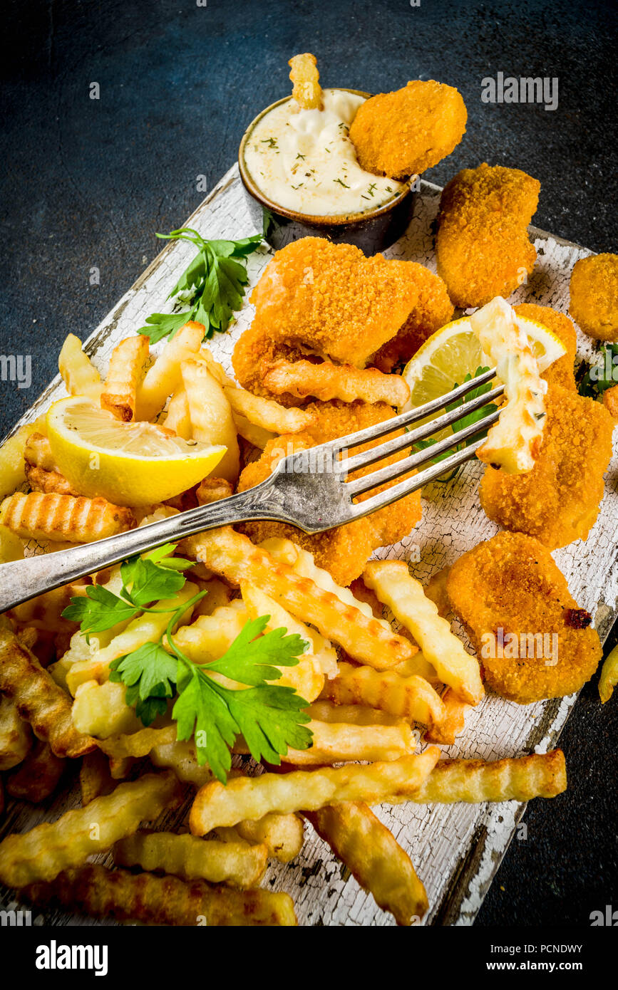 English traditional fast food, junk food, British dish Fish and chips ...