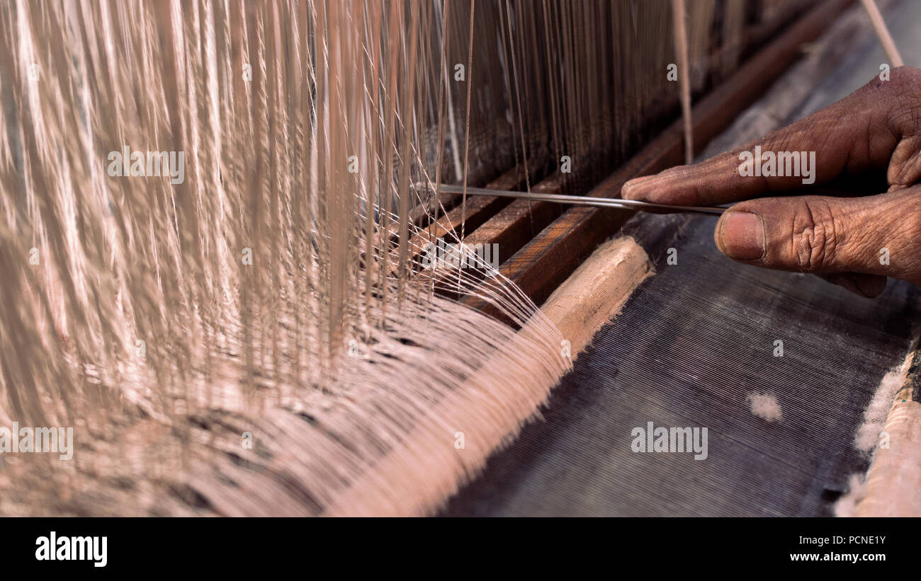 Repairing a broken loom Stock Photo - Alamy