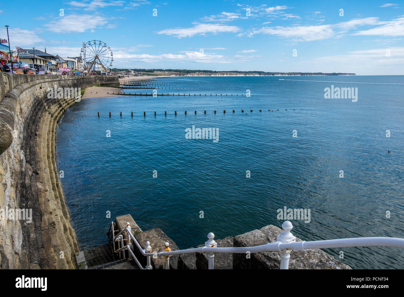 bridlington seafront with the ferris wheel at the far end Stock Photo ...