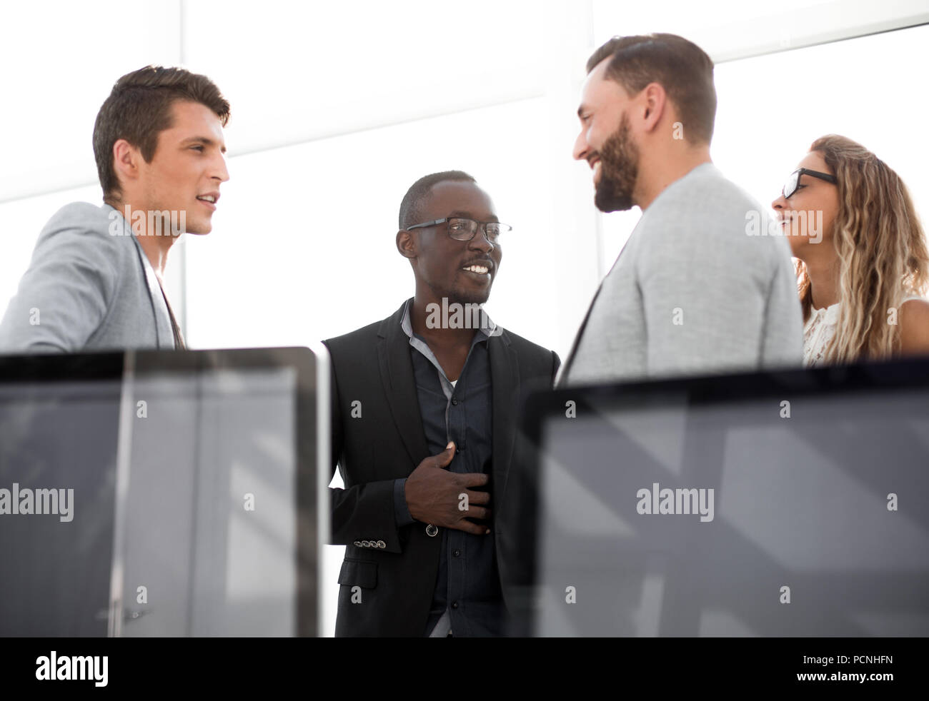 business colleagues, talking during a working break Stock Photo - Alamy