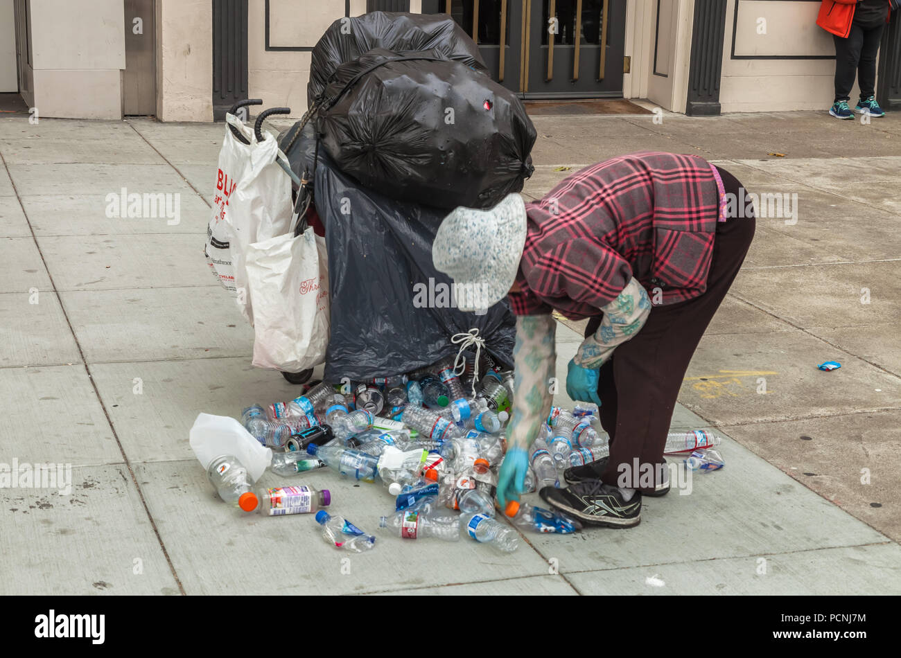 An Elderly Woman Was Sorting Out Plastic Bottles For Recycle San an-elderly-woman-was-sorting-out-plastic-bottles-for-recycle-san