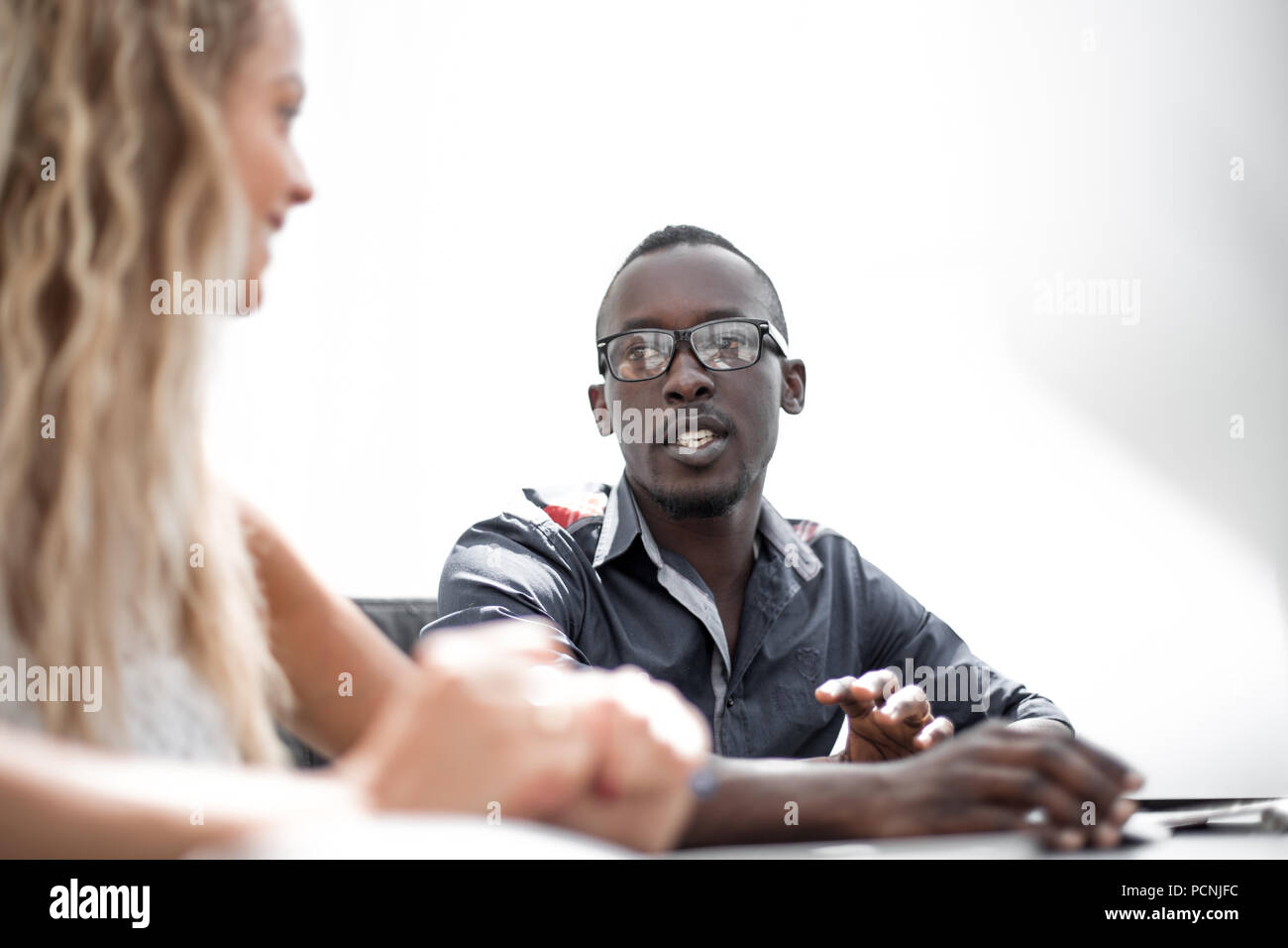 employees are discussing work issues Stock Photo - Alamy