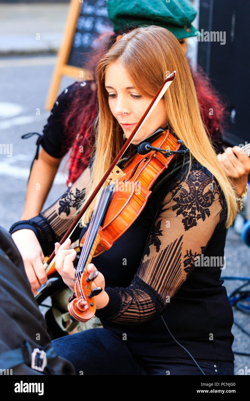 Woman plays fiddle hi-res stock photography and images - Alamy