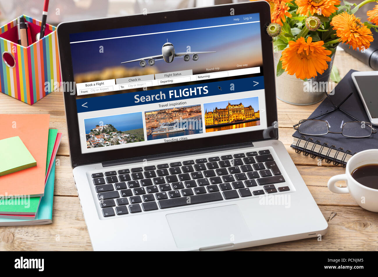 Flight search laptop hi-res stock photography and images - Alamy