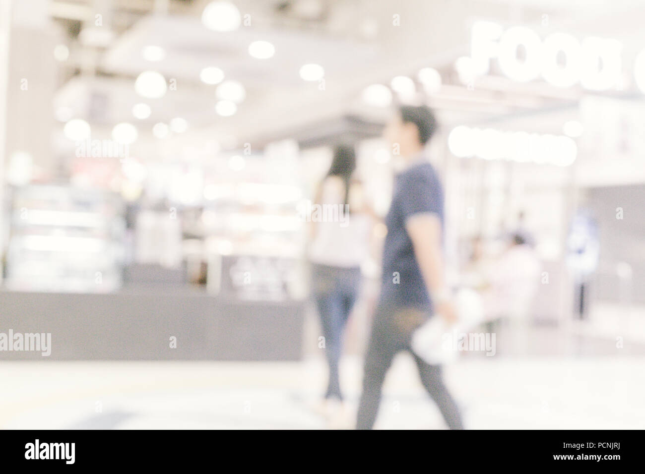 Abstract blur department store with shopping mall interior for ...