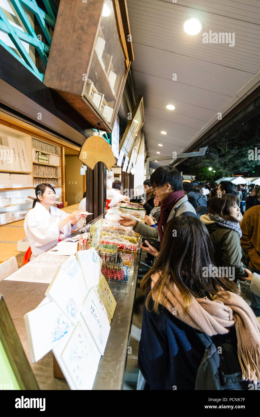 Shogatsu, new year, Nishisnomiya shrine, Japan. People buying good luck ...