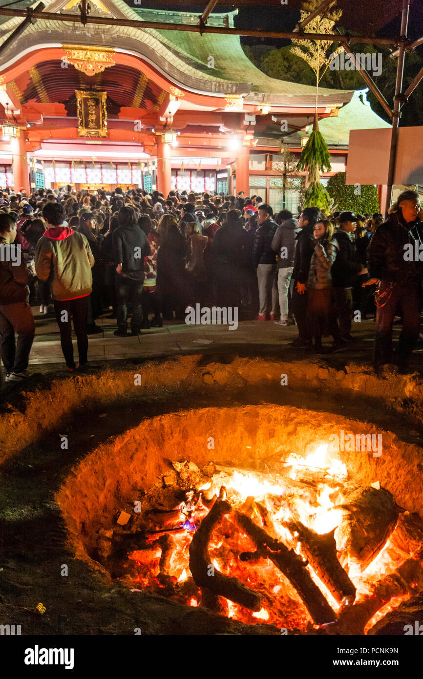 Shogatsu, new year, Nishisnomiya shrine, Japan. People standing around ...