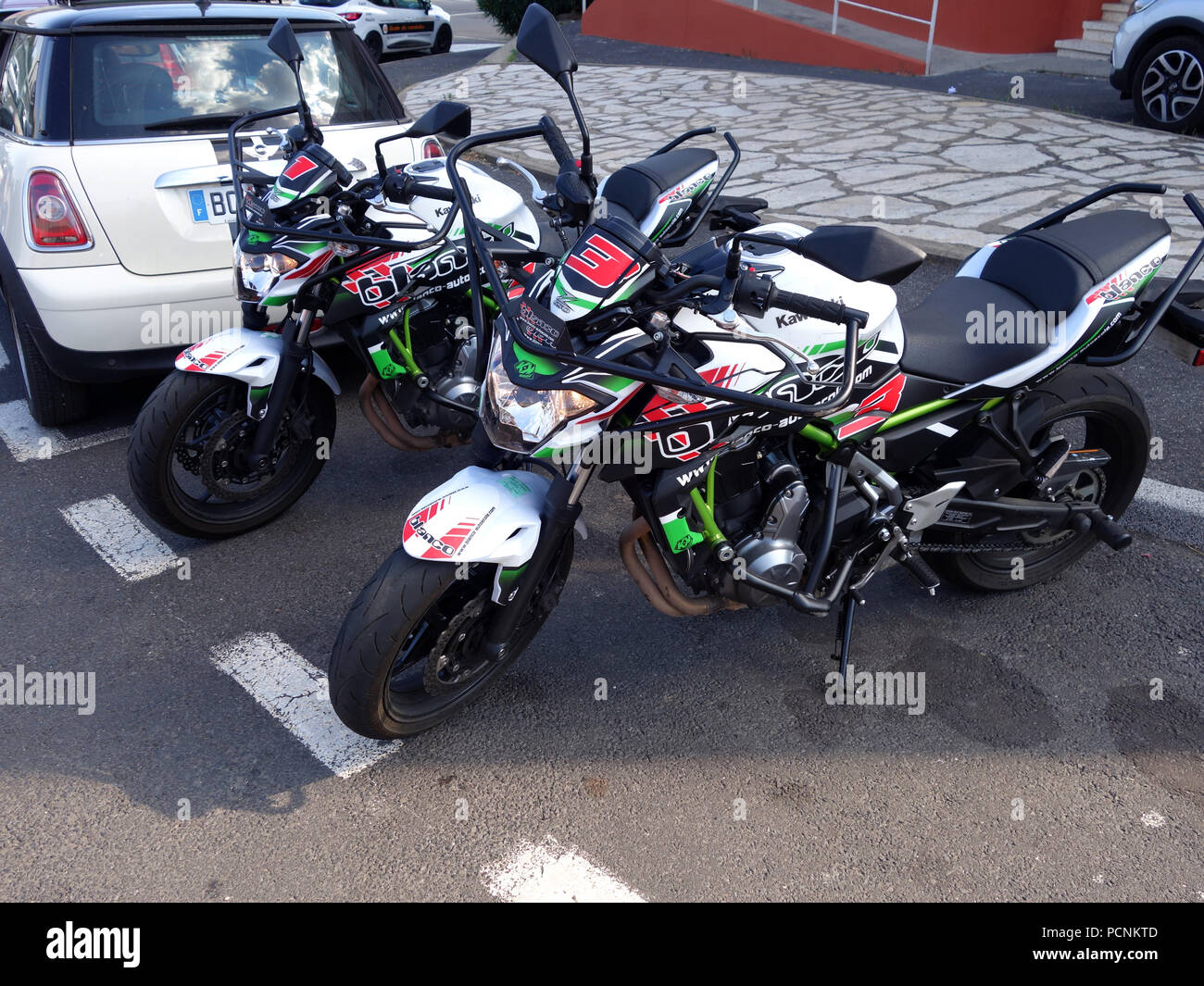 Two motorbikes lined up ready for pupils to learn to ride and pass ...