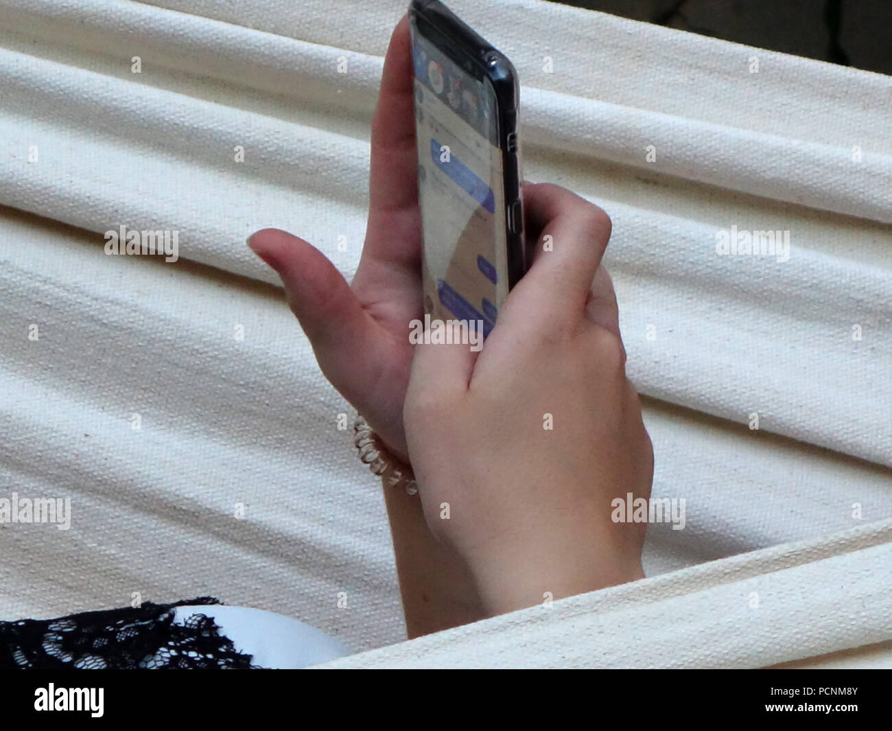close up of young girls hands using her mobile phone Stock Photo - Alamy