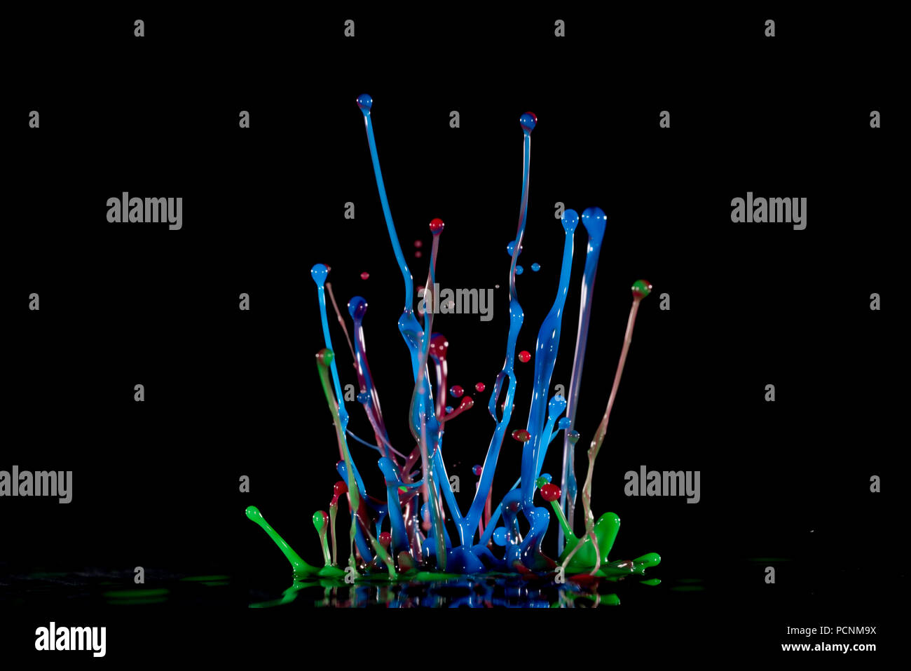 abstract color splash isolated on black background Stock Photo - Alamy