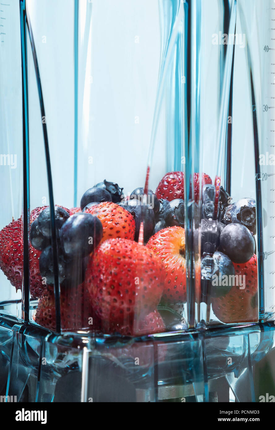 Berry smoothie. Ingredients for berry smoothie in blender close Stock ...