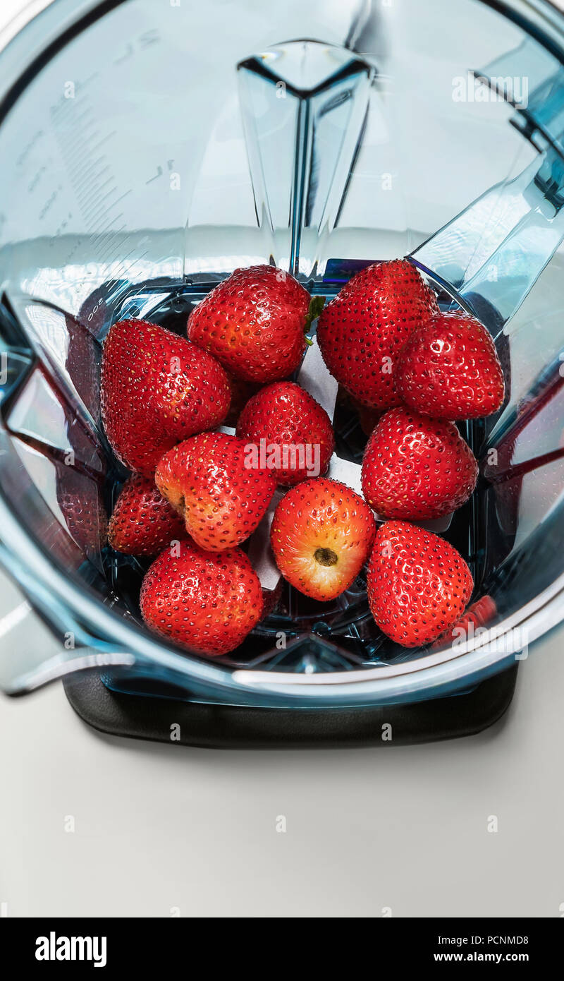 Strawberry in blender on white background top view. Preparation Stock ...