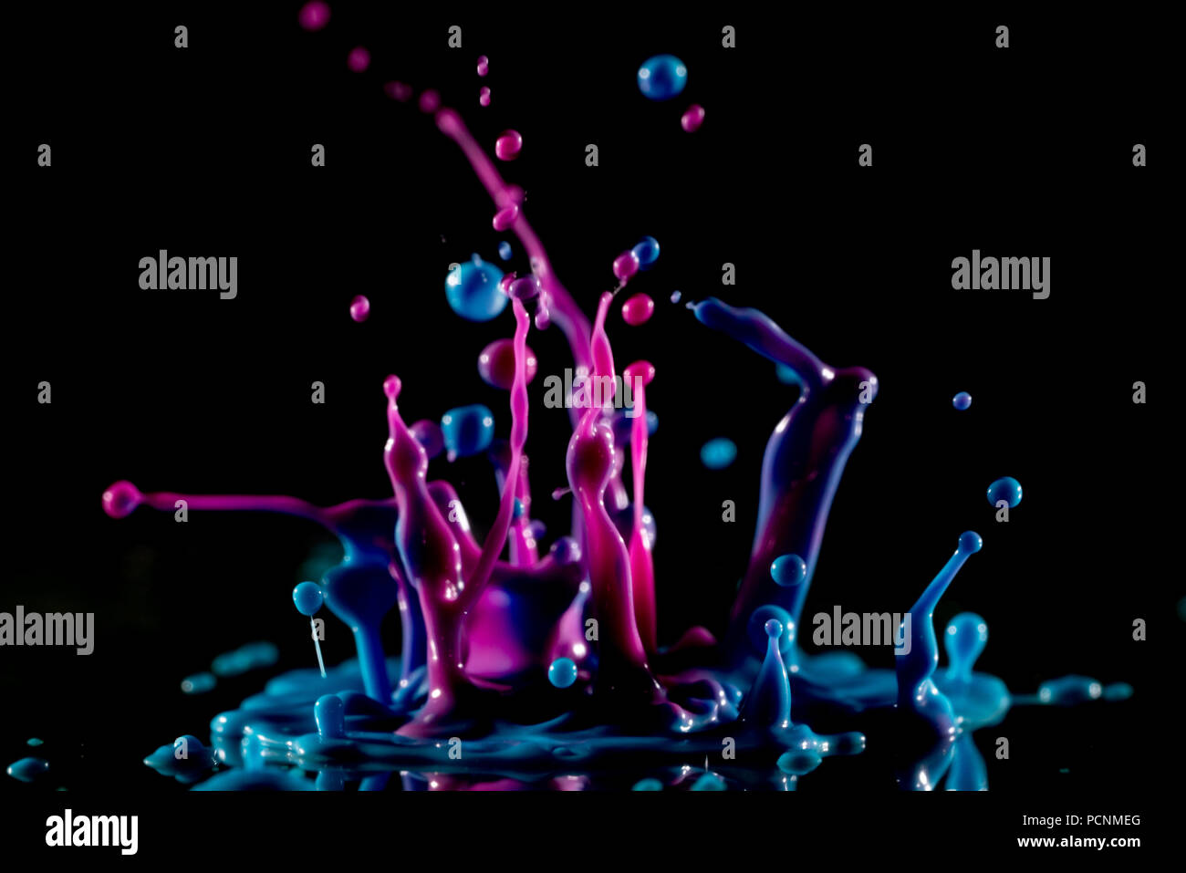 abstract color splash isolated on black background Stock Photo - Alamy