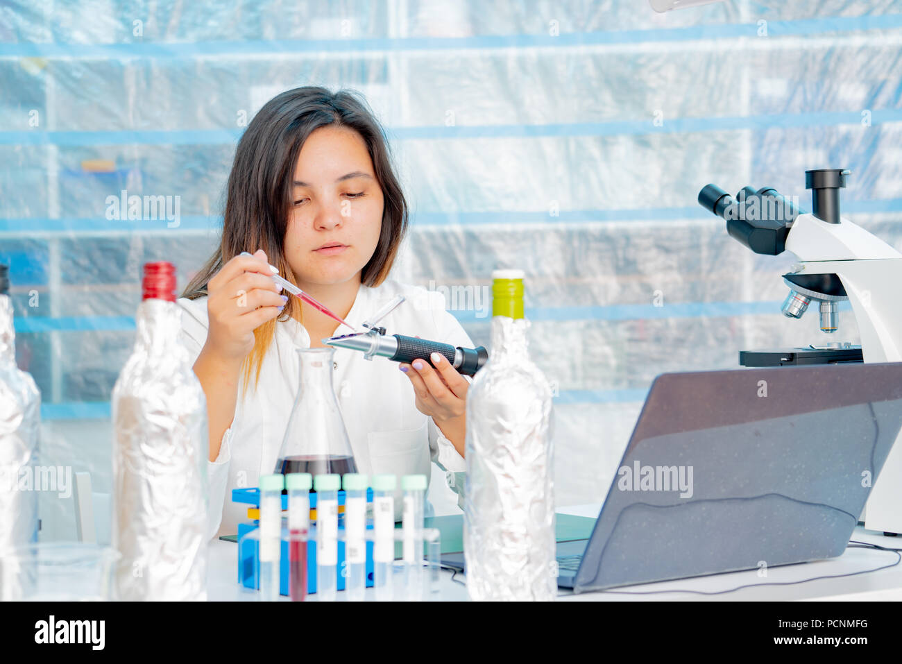 Food inspection, lab, measurement of sugar content with Refractometer ...