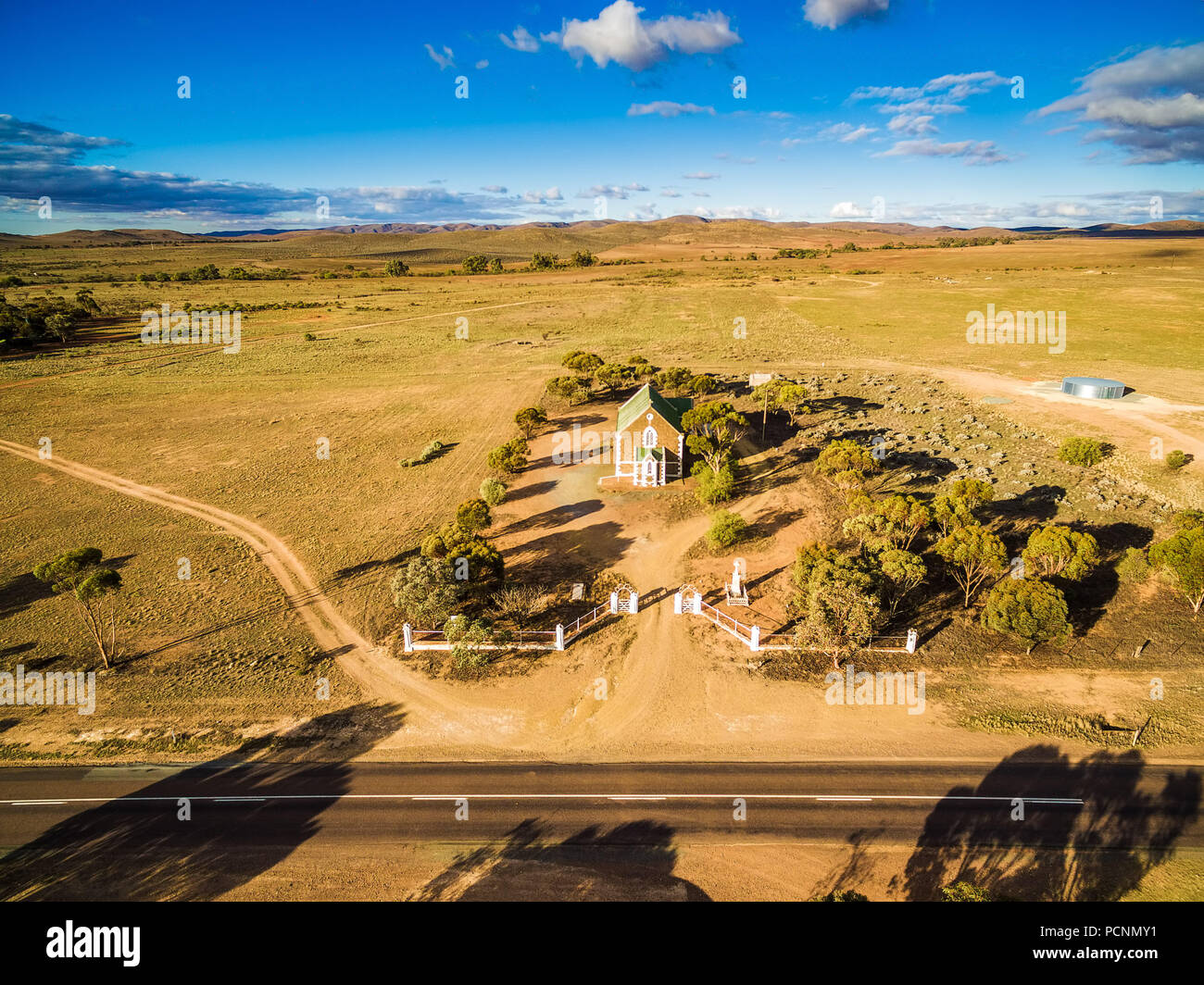 Aerial view of small church building at sunset in Australian ...