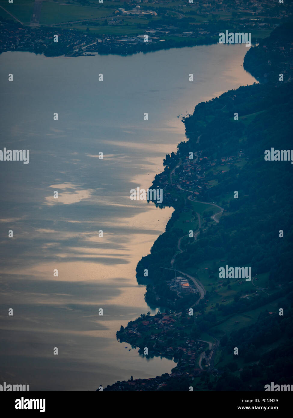 lake brienz seen from the brienzer rothorn, mountain lake during golden ...