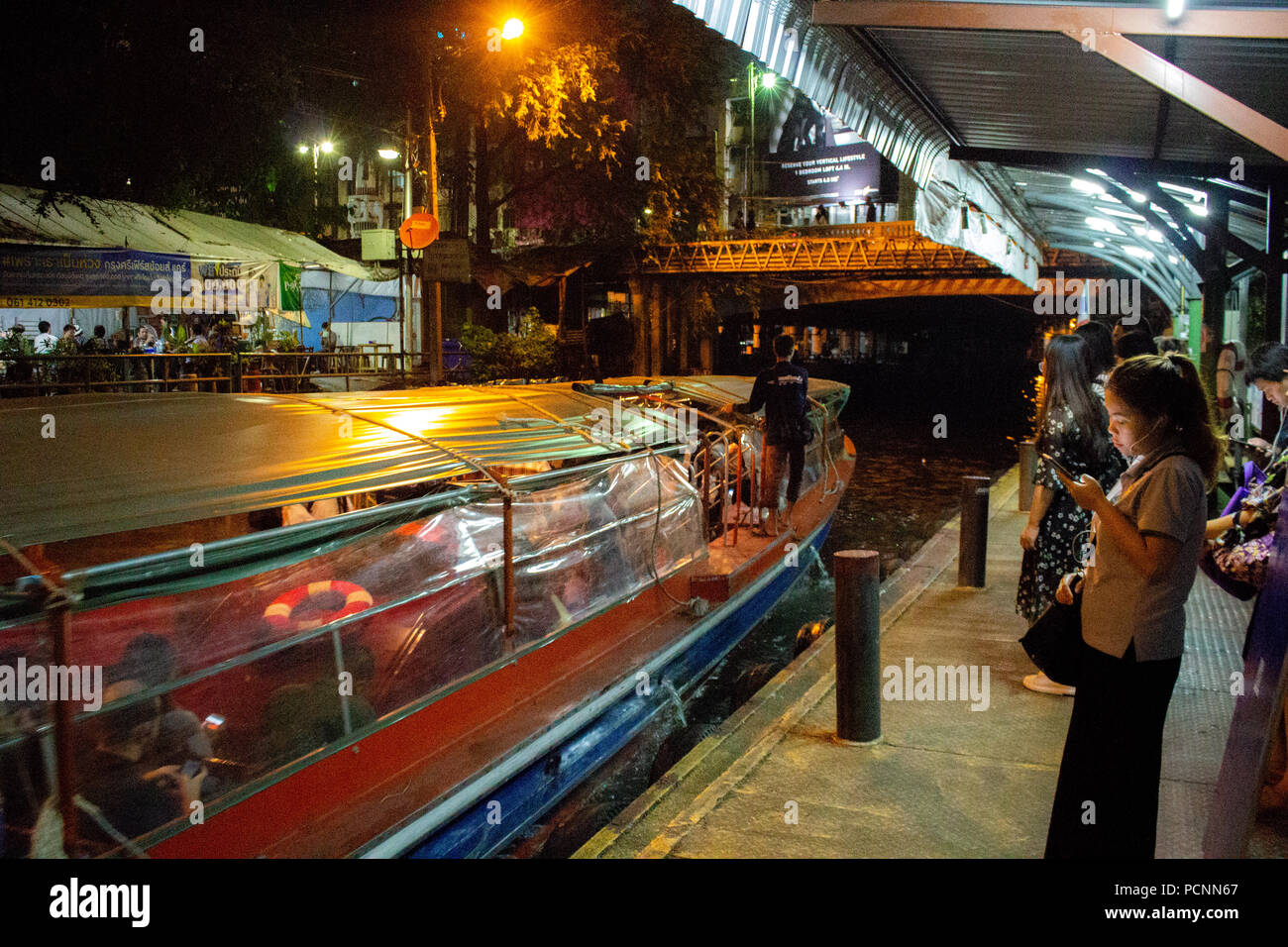 Bangkok, Thailand - April 30, 2018: Passengers waiting for the express ...