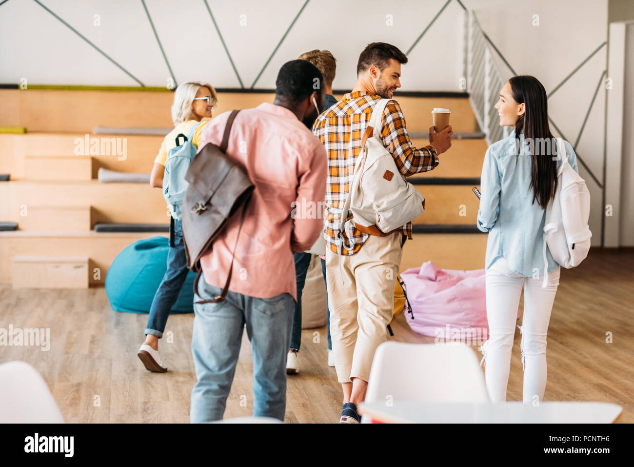 College students walking rear hi-res stock photography and images - Alamy