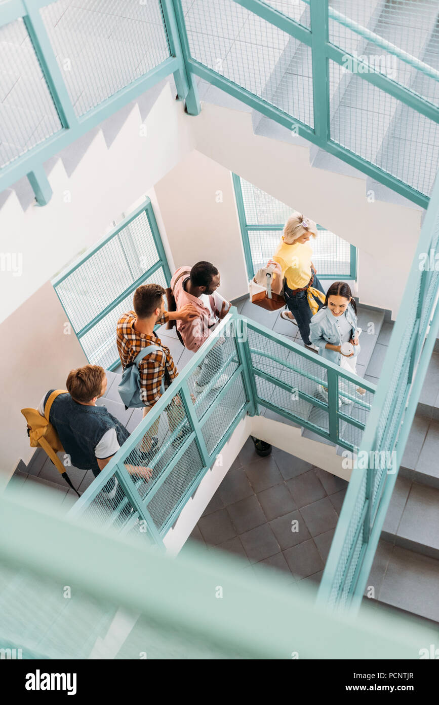 Group of people walking down stairs hi-res stock photography and images ...