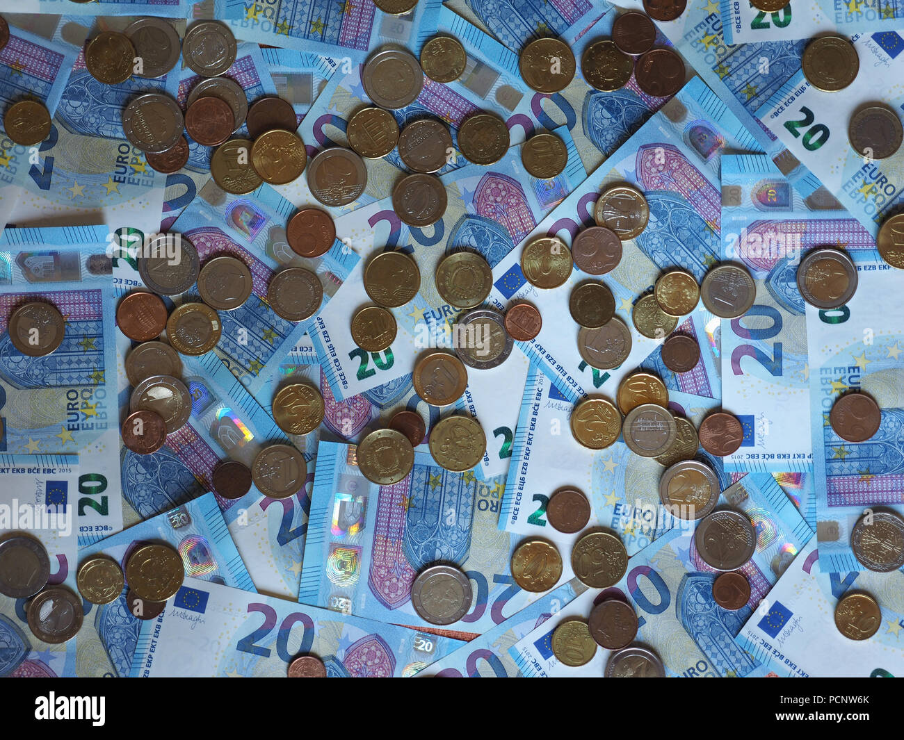 Euro banknotes and coins (EUR), currency of European Union Stock Photo ...