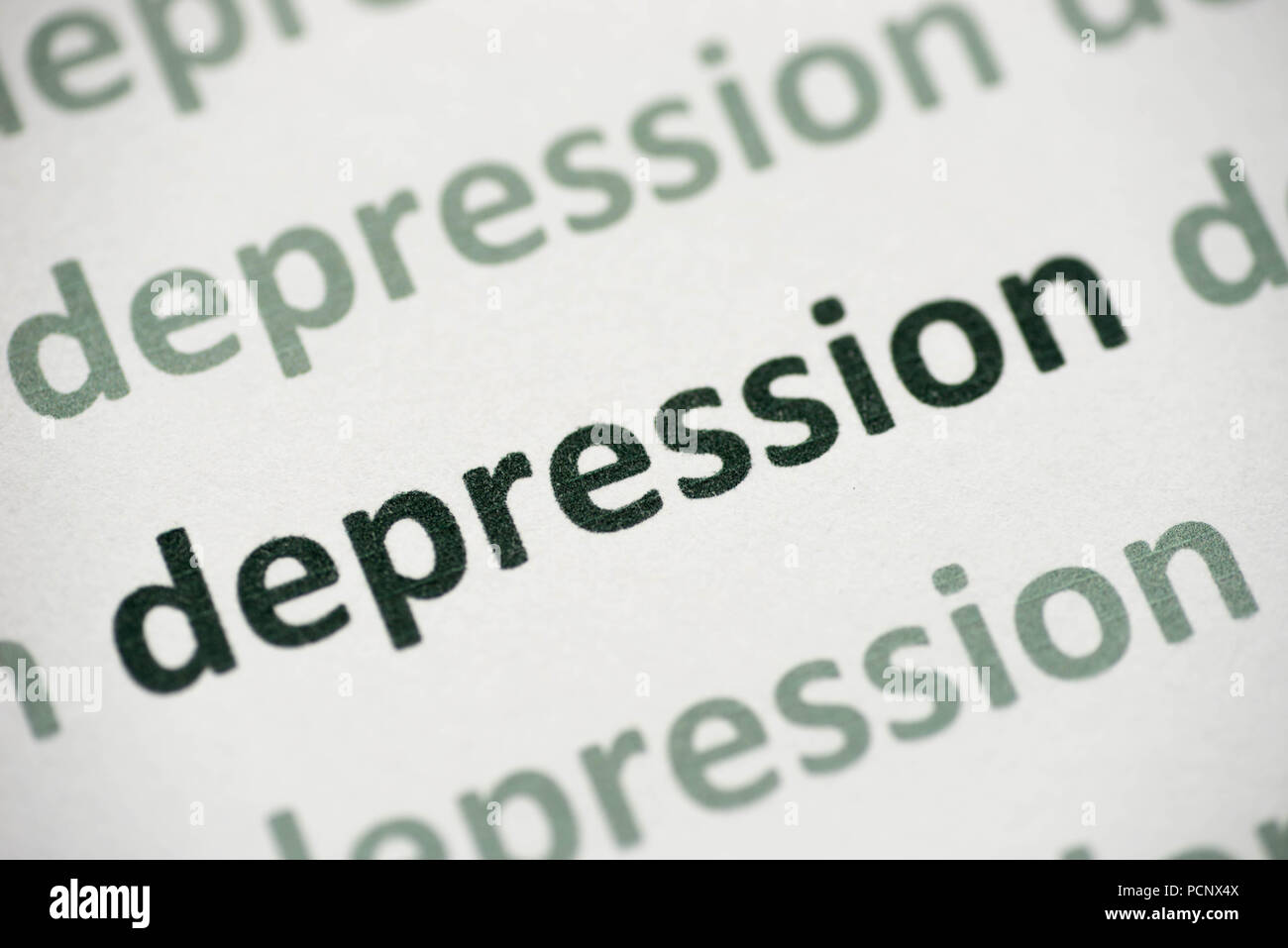 word depression printed on white paper macro Stock Photo - Alamy