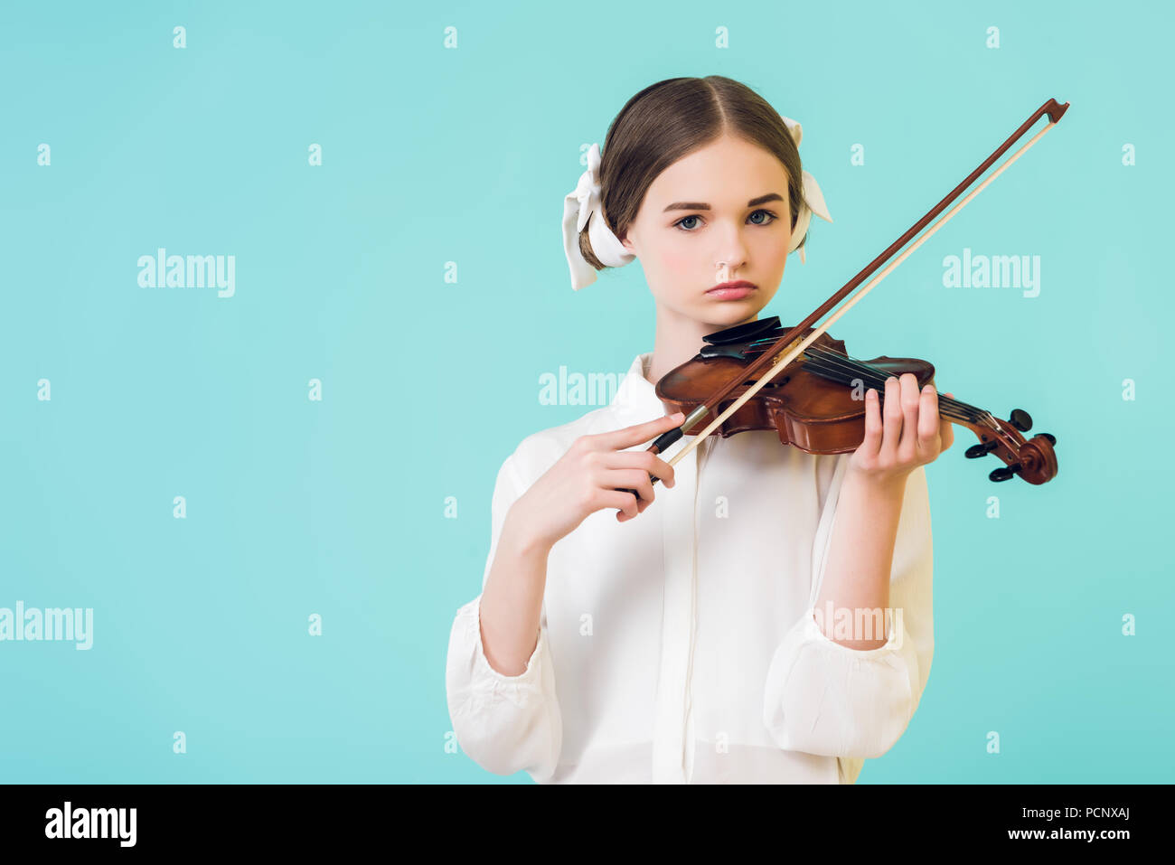 Teen Playing Violin
