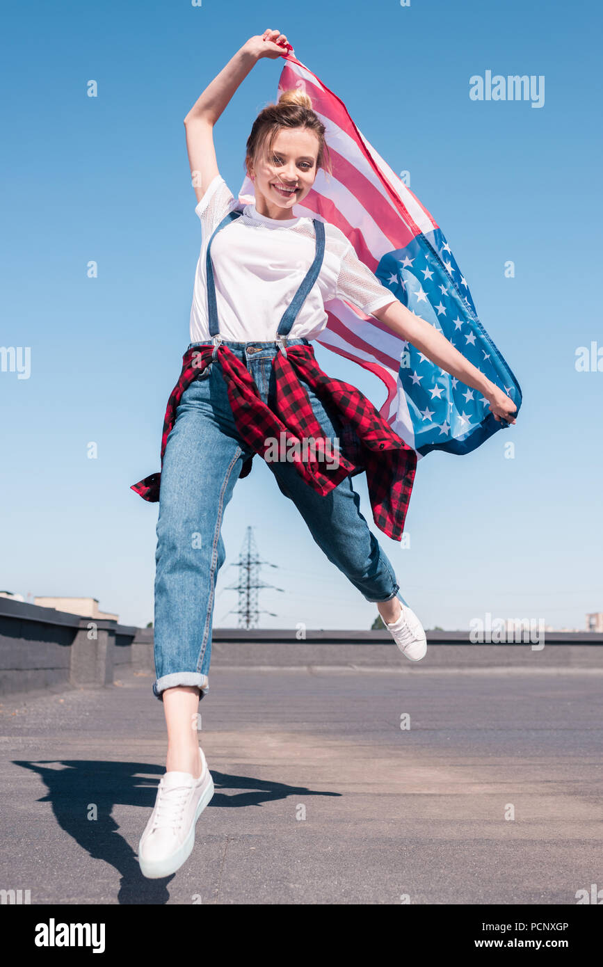 Usa girl jumping flag hi-res stock photography and images - Alamy