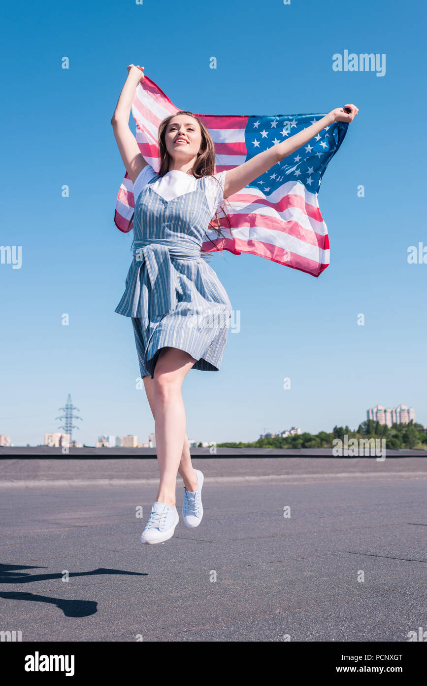 Usa girl jumping flag hi-res stock photography and images - Alamy