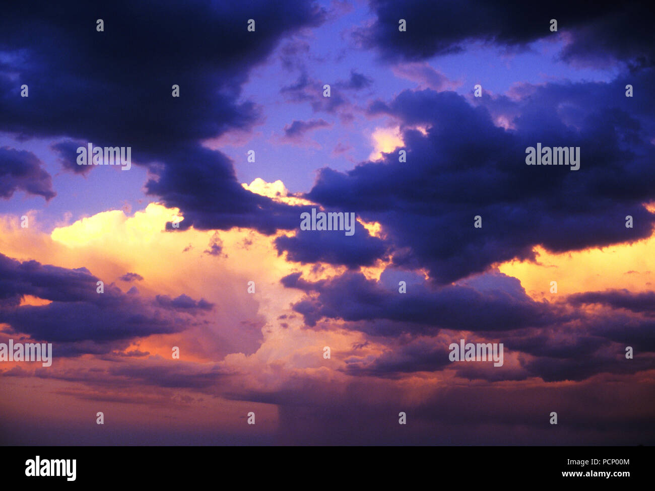 Colorful clouds at sunset Stock Photo - Alamy