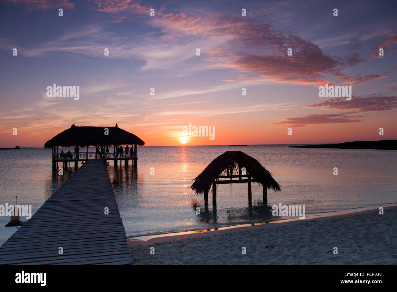 Caribbean, Cuba, Cayo Santa Maria, jetty and huts, sunset, sea Stock ...
