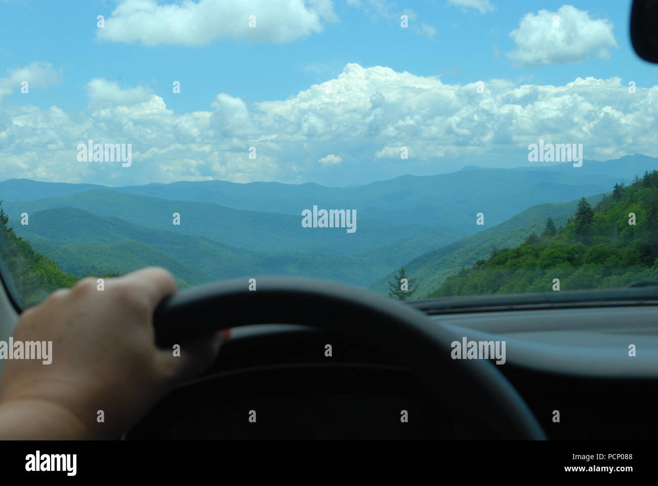 Driver watching through car window hi-res stock photography and images ...