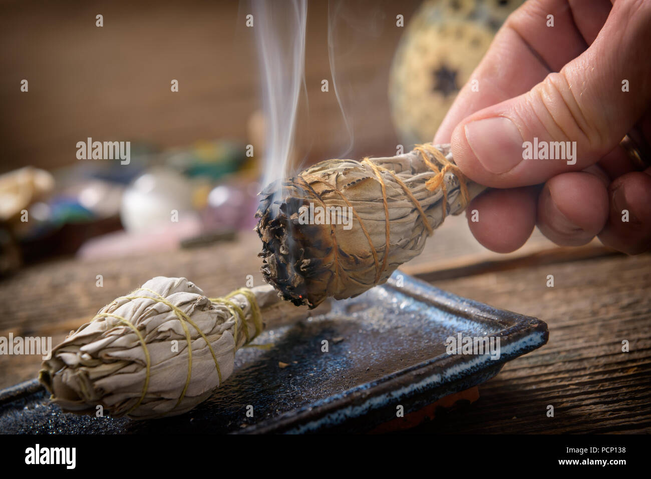 Incense burning hand hi-res stock photography and images - Alamy